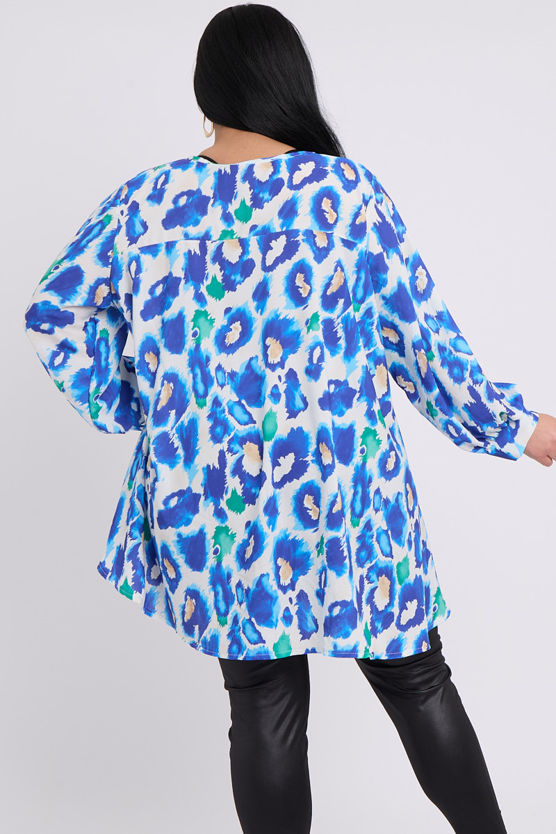 Plus Size Blue Printed V Neck Long Sleeve Flare Top | Praslin Clothing